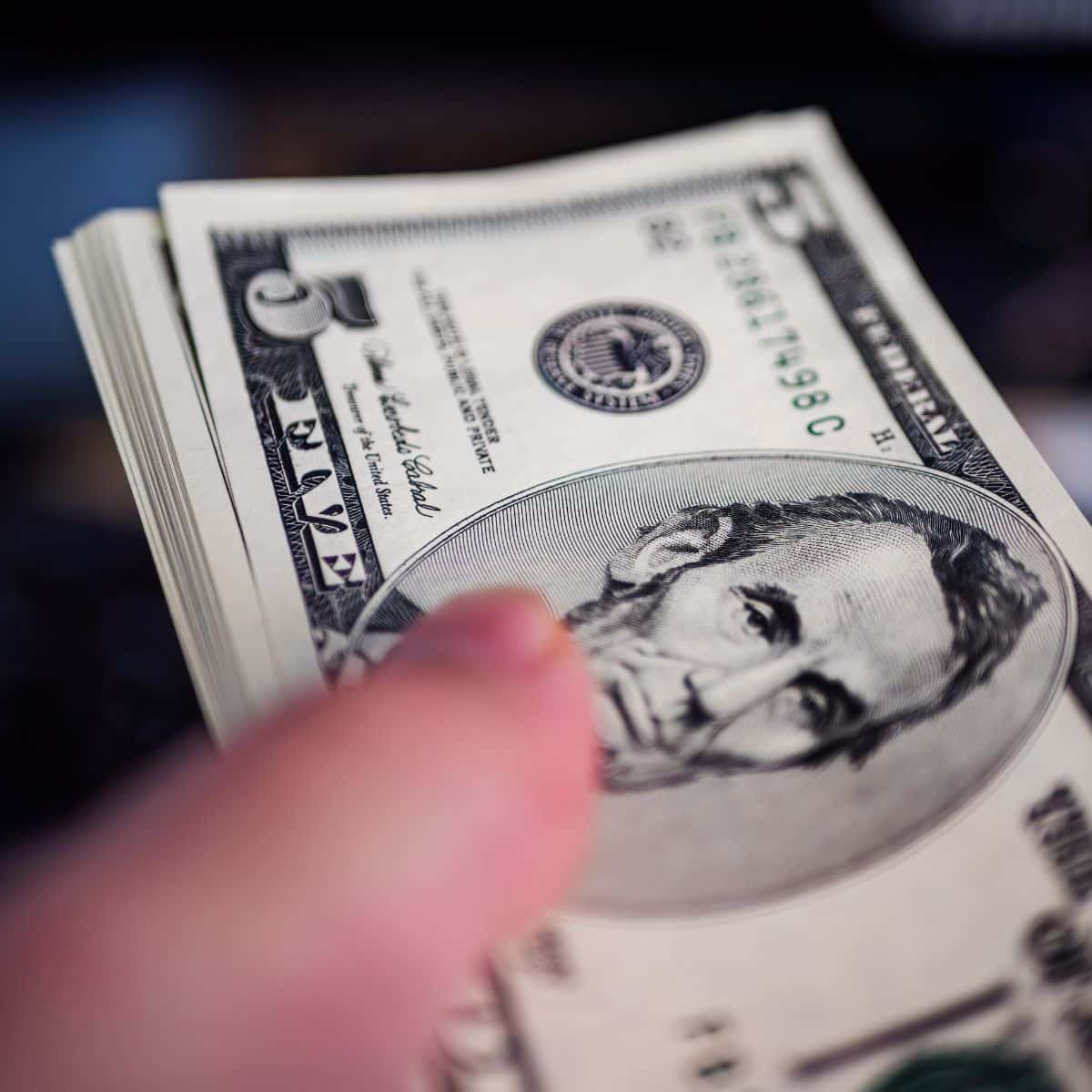 The Spiritual Meaning of Finding 5 Dollars - Awakening State